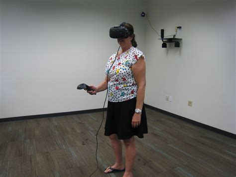 A This Figure Depicts The HTC Vive VR Set Up B This Figure Shows A Download Scientific