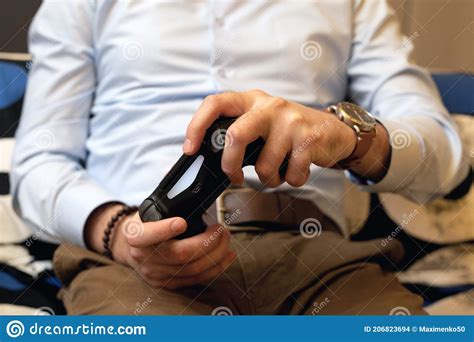 Gaming Adult Man Holding Simulator Keypad Joystic Video Game Console Controller In Gamer Hands