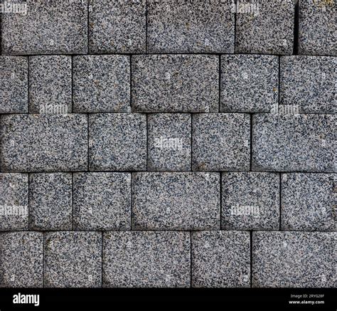 Flat Texture And Full Frame Background Of Gray Cuboid Brick Pavement