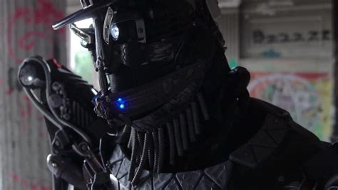 Closeup Of Head With Hat Of Android With Face Footage Android With Glowing Mouth And Detailed