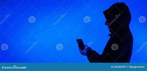 Digital Security Concept Anonymous Hacker With Mask Holding Smartphone Hacked Stock Image