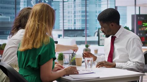 Premium Stock Video Job Seeker At Interview Writing His Name On Application Form