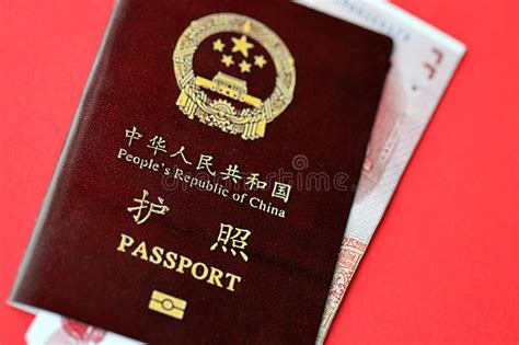 Red Passport Of People Republic Of China And Chinese Yuan Money Bills Prc Chinese Passport