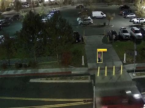 A Person In A Parking Lot Being Identified With Ai