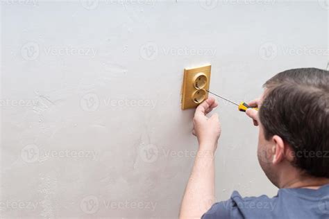 Electrician Replacing Socket In Room 13426565 Stock Photo At Vecteezy