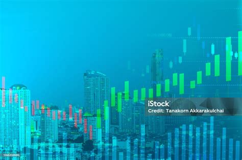 녹색 배경 비즈니스 또는 재무 차트 개념의 이중 노출 주식 그래프 표시기 및 도시 경관 보기 왼쪽의 복사 공간 0명에 대한 스톡