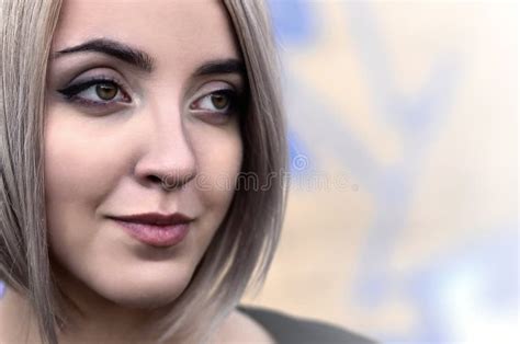 Portrait Of A Young Blond Girl With Short Hair On A Background O Stock
