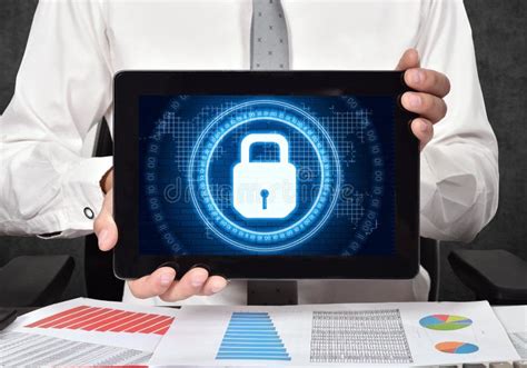 Businessman Holding Tablet Computer And Digital Lock Icon Interface