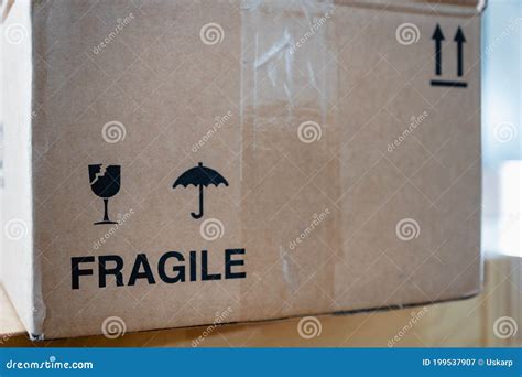 Parcel Box With Fragile Warning Symbol For Shipping Transport Stock