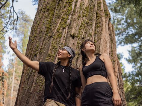 Indigenous Man And Woman Under A Tree Stock Photo Adobe Stock