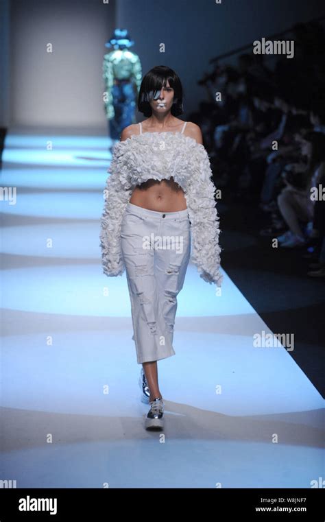A Model Displays A New Creation At The Zhang Yuhao Fashion Show During The Shanghai Fashion Week