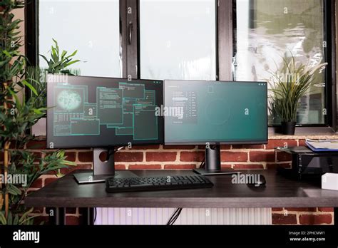 Empty Coding Room With Multiple Monitors On Desk Computers In