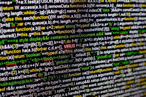 Macro Photo Of Computer Screen With Program Source Code And Highlighted