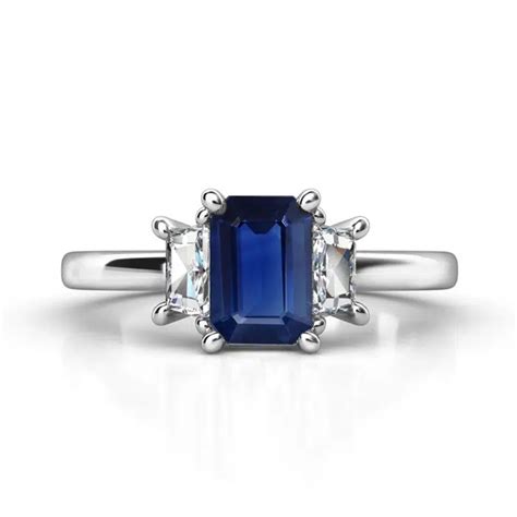 Emerald Cut Sapphire Three Stone Engagement Ring
