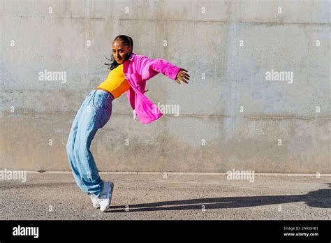 Dancer On Tip Toe In Front Of Wall Stock Photo Alamy