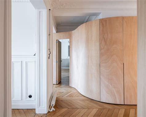 Wood Ribbon Apartment In Paris Features An Undulating Timber Wall