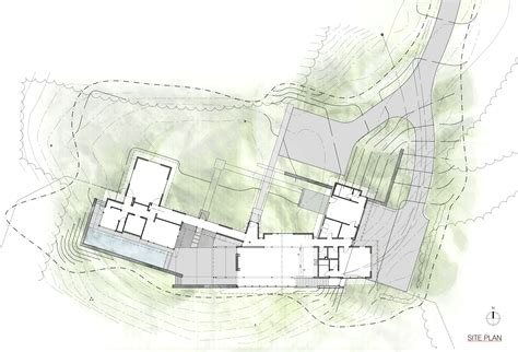 Carlton Clads North Carolina Home In Dark Cedar And Weathering Steel