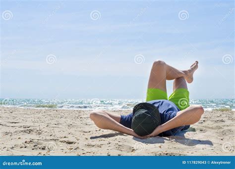 Man Laying On His Back On Beach Stock Image Image Of Nature Coast