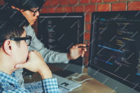 Premium Photo Developing Programmer Team Development Website Design And Coding Technologies