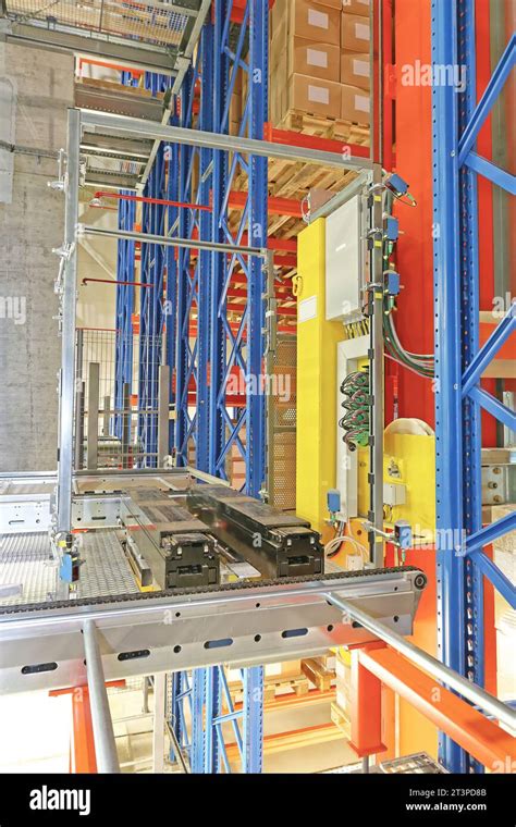 automated storage and retrieval system shuttle robot forks in