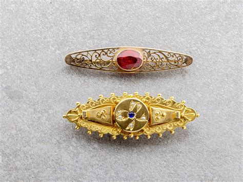 Lot A Pair Of Gold And Gem Set Antique Brooches Comprising A 14ct