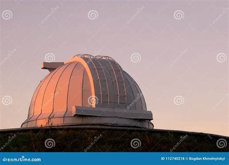 White Dome Of A Large Telescope In The Observatory At Sunset Stock
