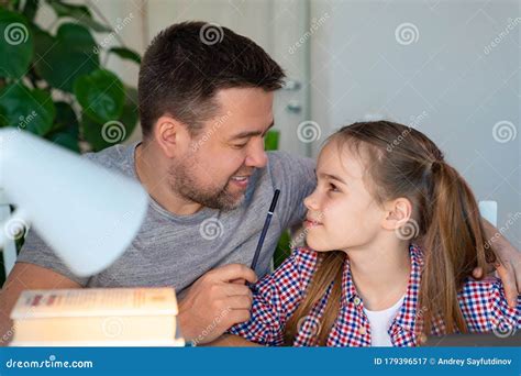 Daddy Helps Daughter With Online Lessons On Laptop Stock Image Image