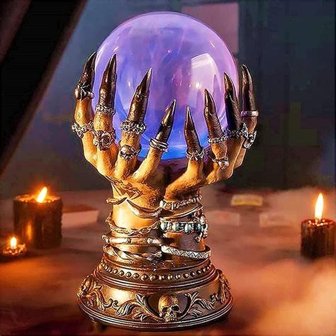 Hand Holding Crystal Ball