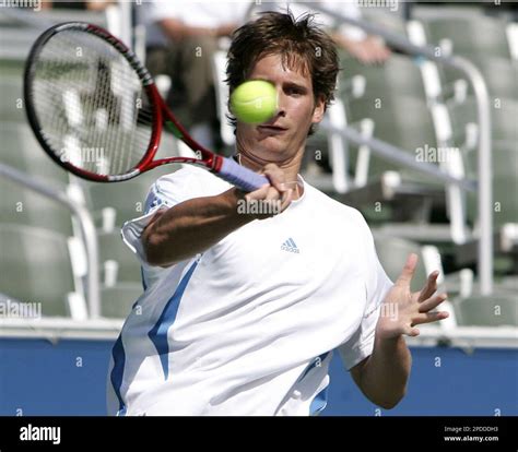 Florian Mayer From Germany Returns The Ball To Oliver Marach From