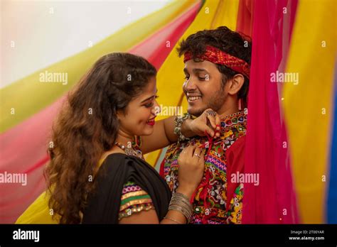 A Gujarati Couple Dressed In A Traditional Gujrati Attire During The