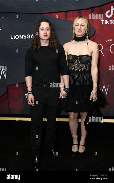 Rory Culkin Left And Katelin Arizmendi Attend The Crow World