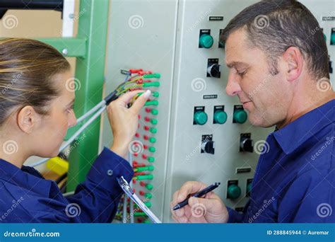 Engineers Man And Woman With Management Console Stock Photo Image Of Woman Datacenter 288845944