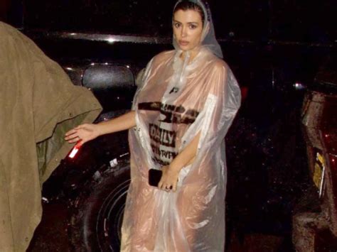 Bianca Censori Dons Transparent Raincoat With Nothing Underneath During Los Angeles Outing With