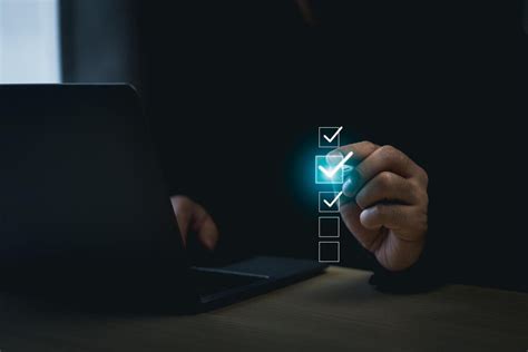 Premium Photo Completing Online Checklist On Laptop Professional Completing A Digital