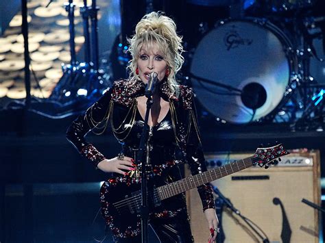 Dolly Parton Playing Guitar