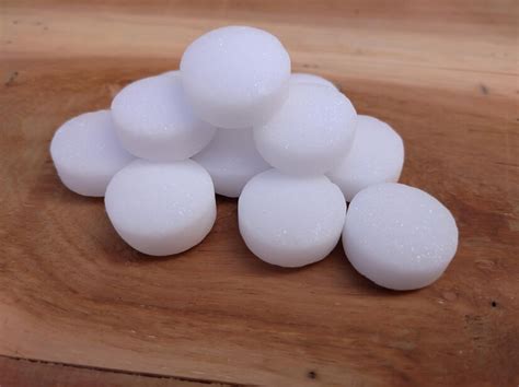 Premium Photo Mothballs With Wood Background Round Camphor