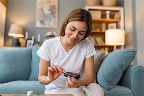 Premium Photo Blood Sugar Testing At Home Checking Blood Sugar Level At Home Diabetic Checking