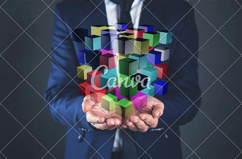 Man Presenting Multiple Cubes In Hands Photos By Canva