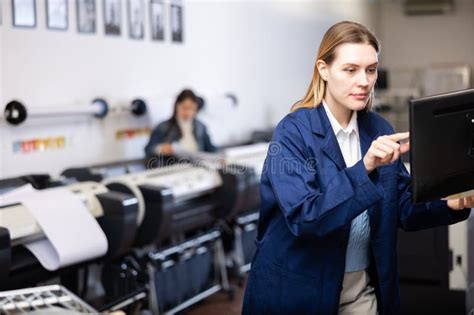 Technician Operator Calibrating Plotter Machine Typing On Computer Keyboard Stock Image Image