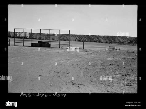 A Photograph Capturing A Typical Mining Community Reflecting The