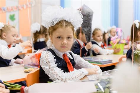 Premium Photo A Schoolgirl Girl In Class E For The First Time