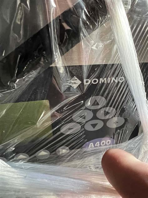 Domino A400 Ink Jet Lot Code Printer Revelation Machinery