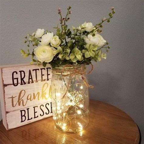 Mason Jar Centerpieces With Lights And Flowers At Mario Terrance Blog