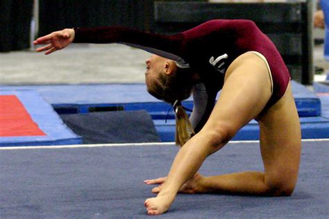 Gymnast A Gymnast Poses During Her Floor Routine During Th… Flickr