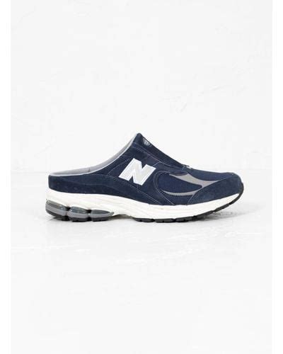 Blue New Balance Slip On Shoes For Men Lyst