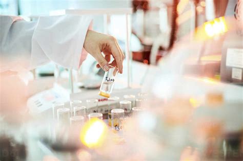 Labratory Scientist Extracting Dna And Biological Material For Testing
