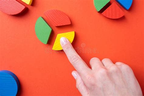 Hands Working With Colorful Wooden Pie Chart Pieces Stock Image Image