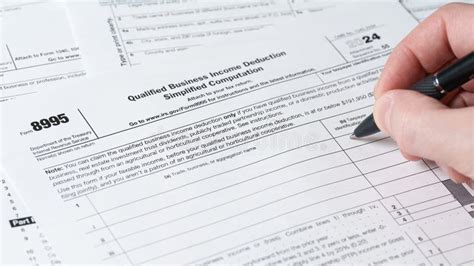 Form 8995 Qualified Business Income Deduction Simplified Worksheet Irs Tax Document Close Up