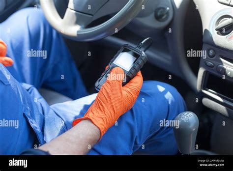 Man Using Car Diagnostic Scan Tool Stock Photo Alamy