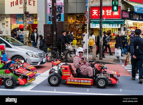 Tokyo Shibuya Crossing Go Karting Mario Karts With Caucasians Dressed As Their Favourite